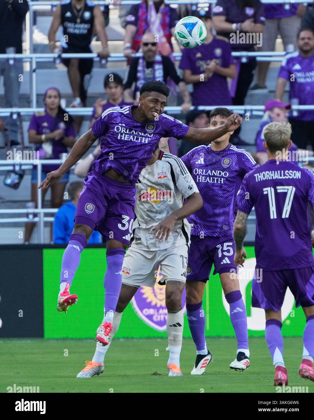 Orlando City defender Alex Freeman (30) gets an advantage on a head ...