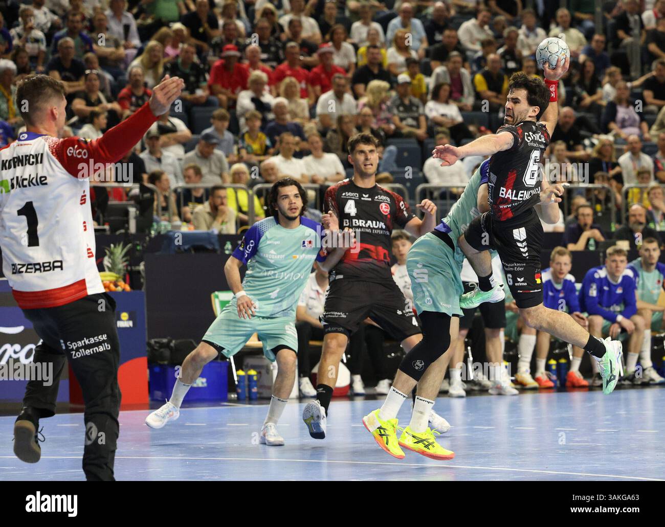 Koeln, Deutschland. 12th Apr, 2025. v.l. Mateusz Kornecki (HBW Balingen ...