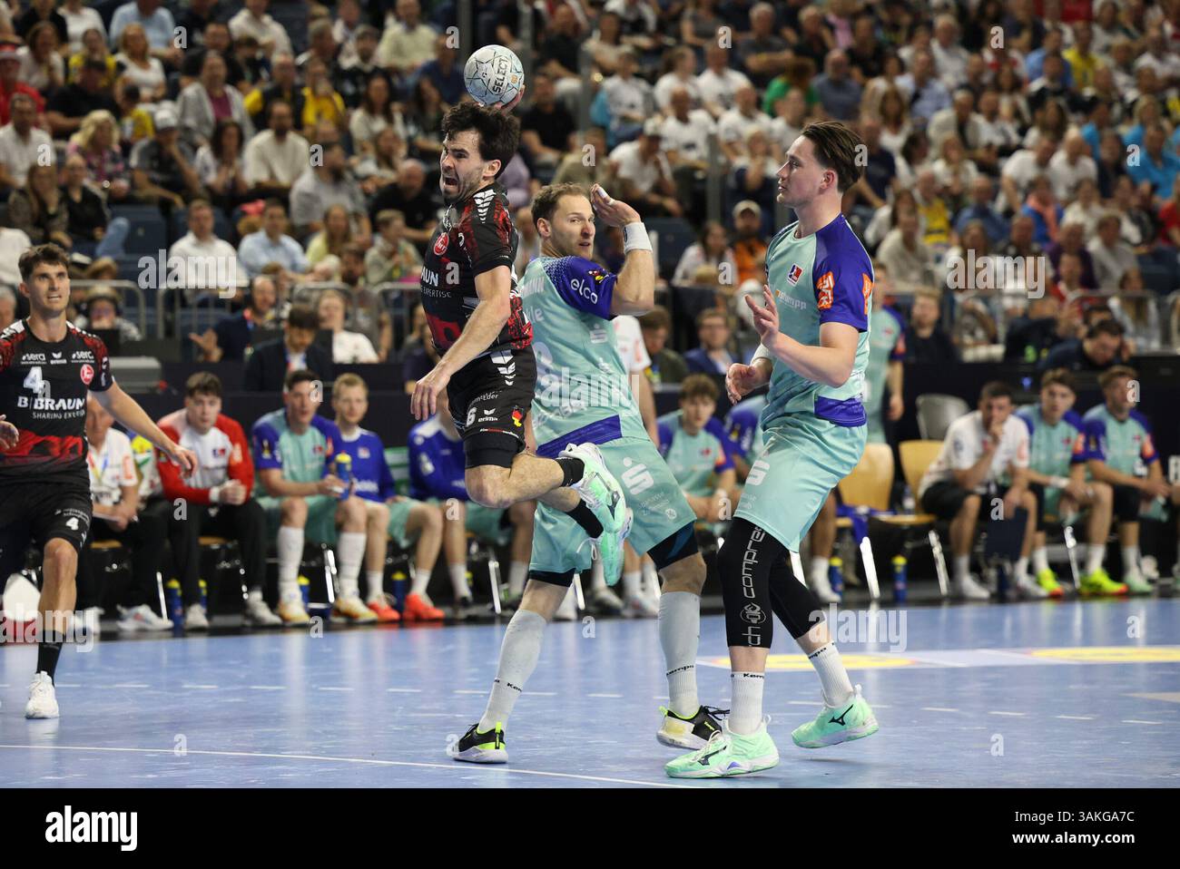 v.l. Nikolaj Enderleit (MT Melsungen #04), Erik Balenciaga (MT ...