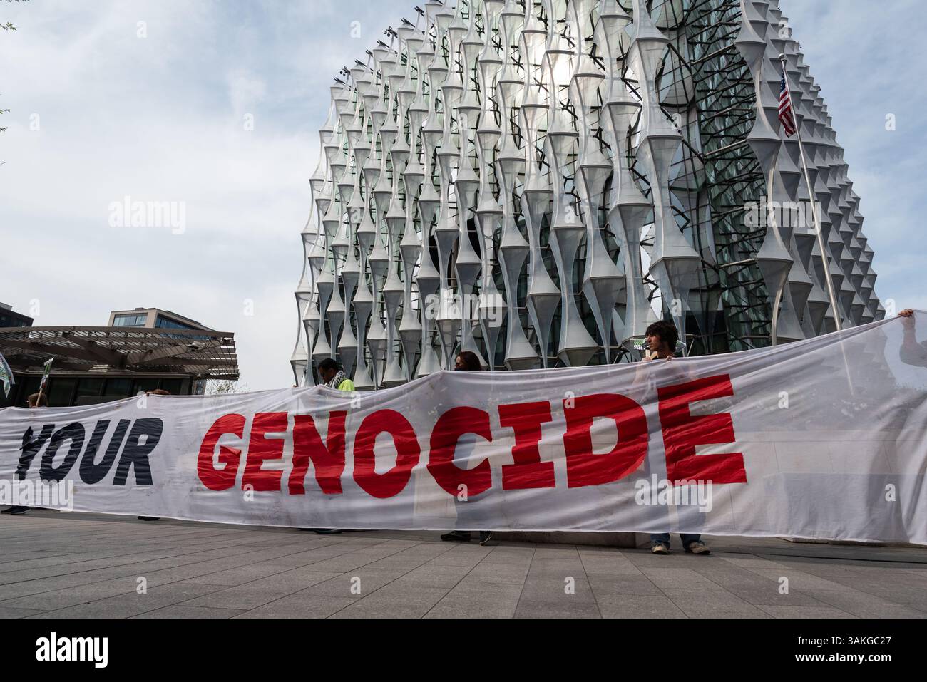 London, UK. 12 April, 2025. A large banner declaring "Your Genocide" is ...