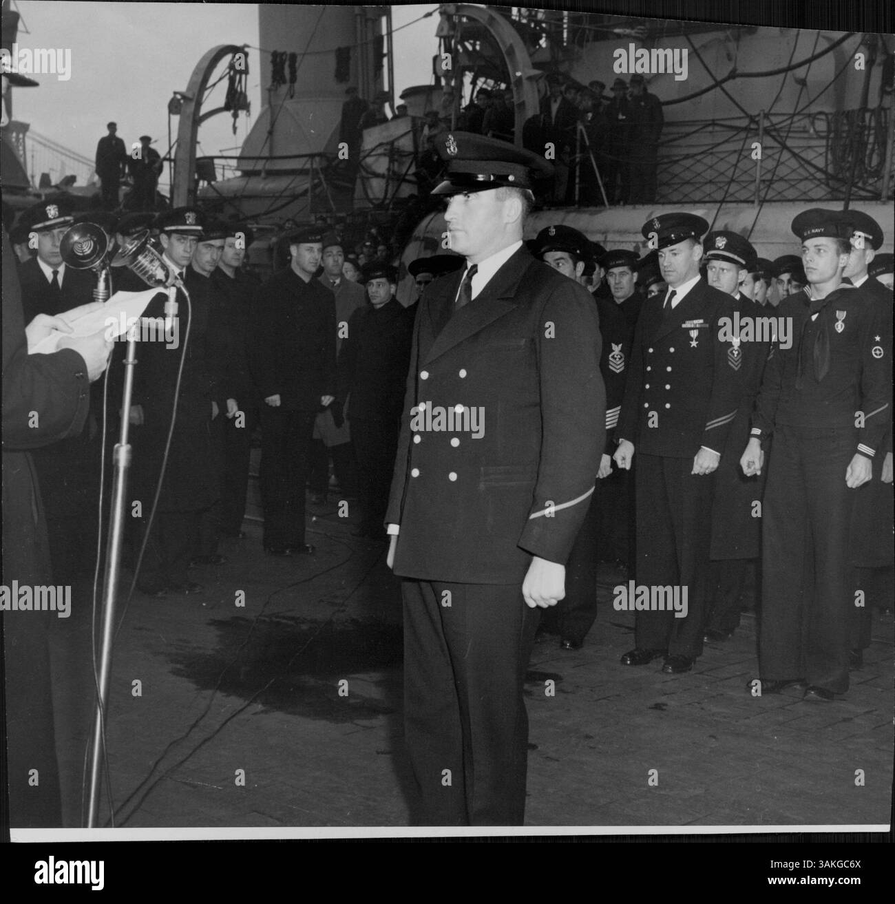 Carl Ernest Koehler, Chief Fire Controlman in the U.S. Navy, receives a ...