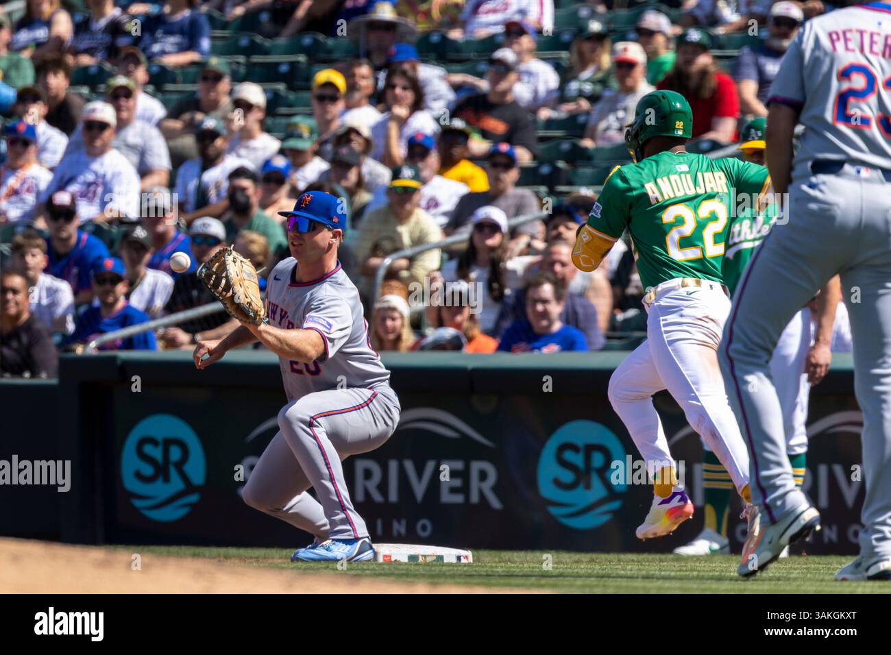 New York Mets first baseman Pete Alonso (20) forces out Athletics ...