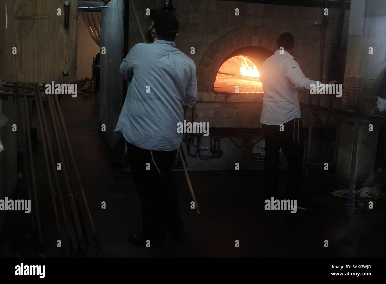 April 3, 2017 - Kfar Chabad, Israel - Men prepare hand made matzah in ...