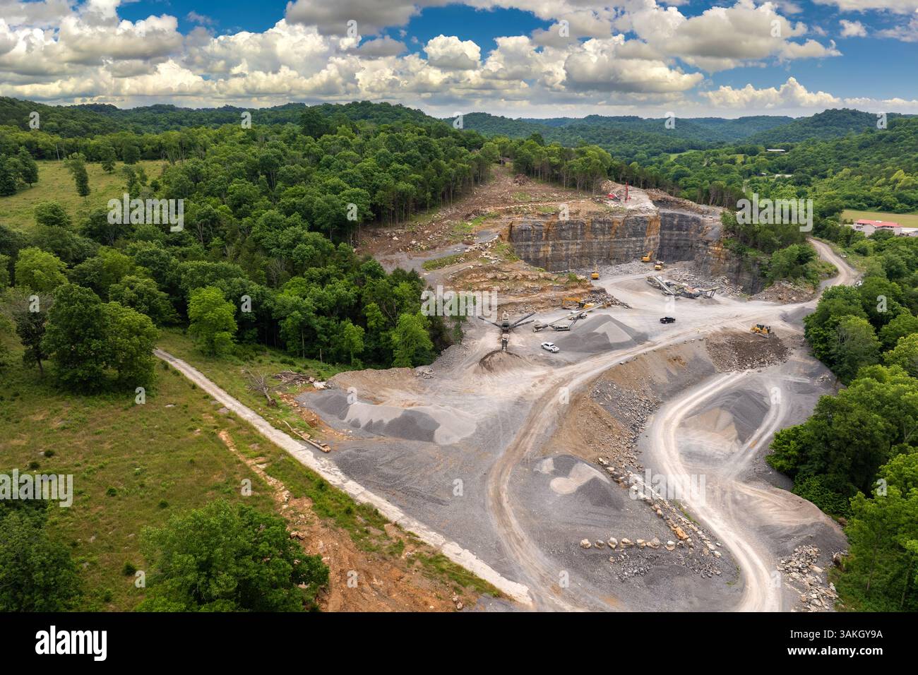 Industrial gravel quarry. Open pit mining site of limestone materials ...