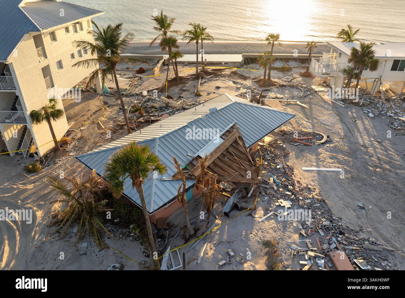 Natural disaster and its consequences. Hurricane destroyed houses roof ...