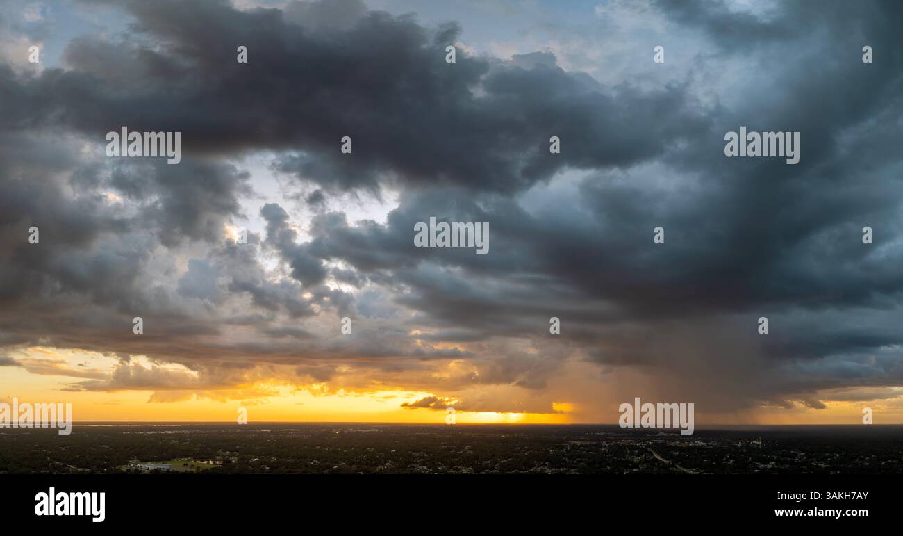 Tropical storm in Florida at sunset. Stormy clouds forming during heavy ...