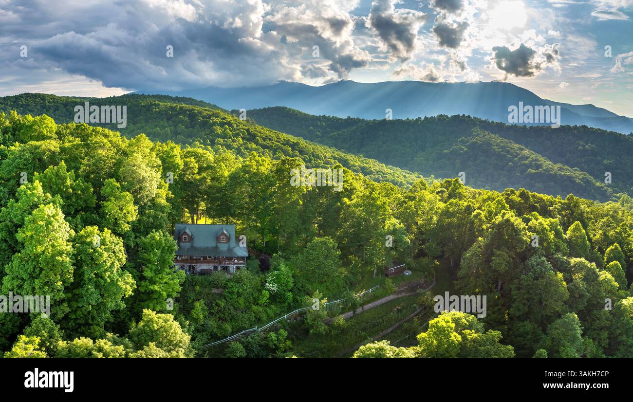 USA travel destination. Mount Mitchell and remote house in mountain ...
