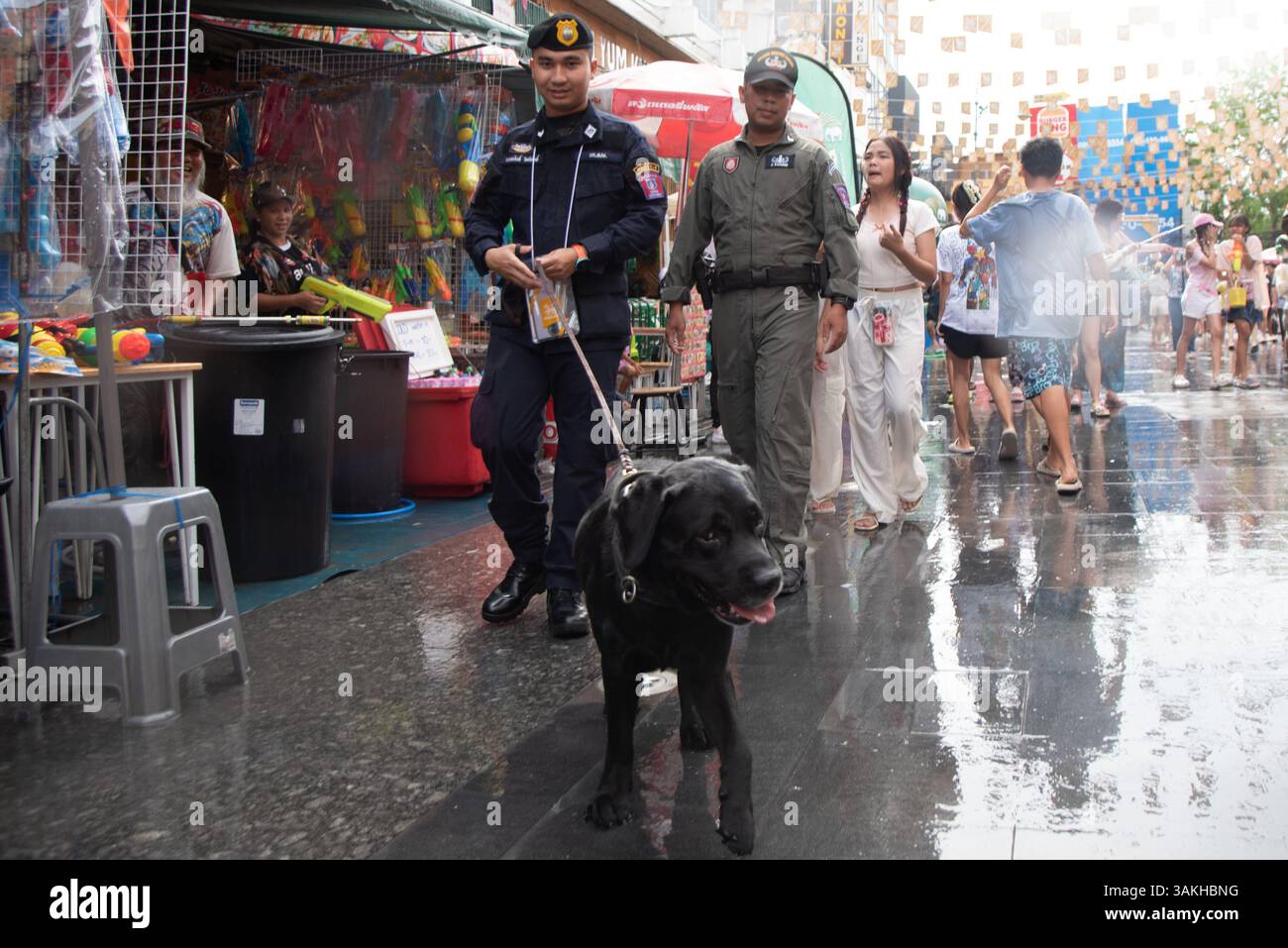 Bangkok, Thailand. 12th Apr, 2025. A Dog K9 and Their Handlers, taking ...