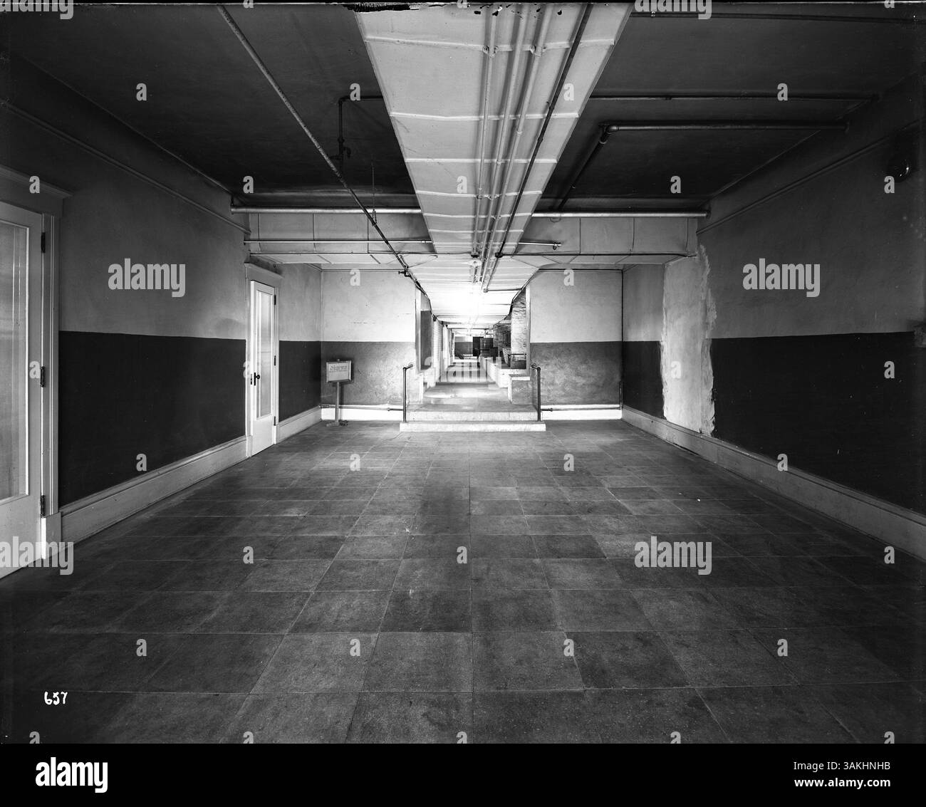 The photograph captures the interior of Monroe School's basement ...