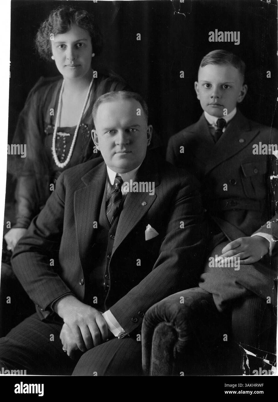 Mr. and Mrs. Erle E. Luce are depicted with their son Billy ...