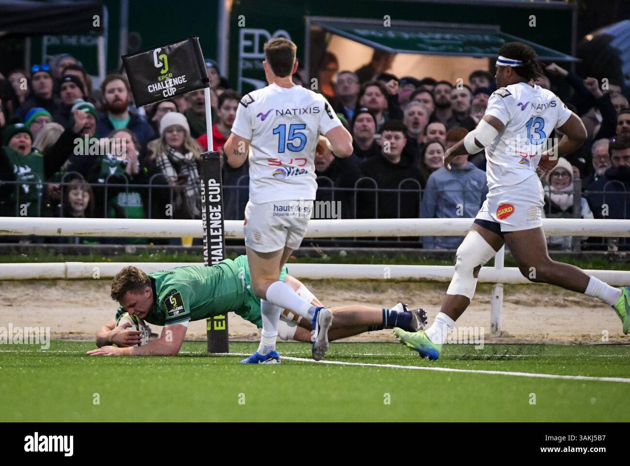 Galway, Ireland. 12th April, 2025. Connacht's Cian Prendergast scores a ...