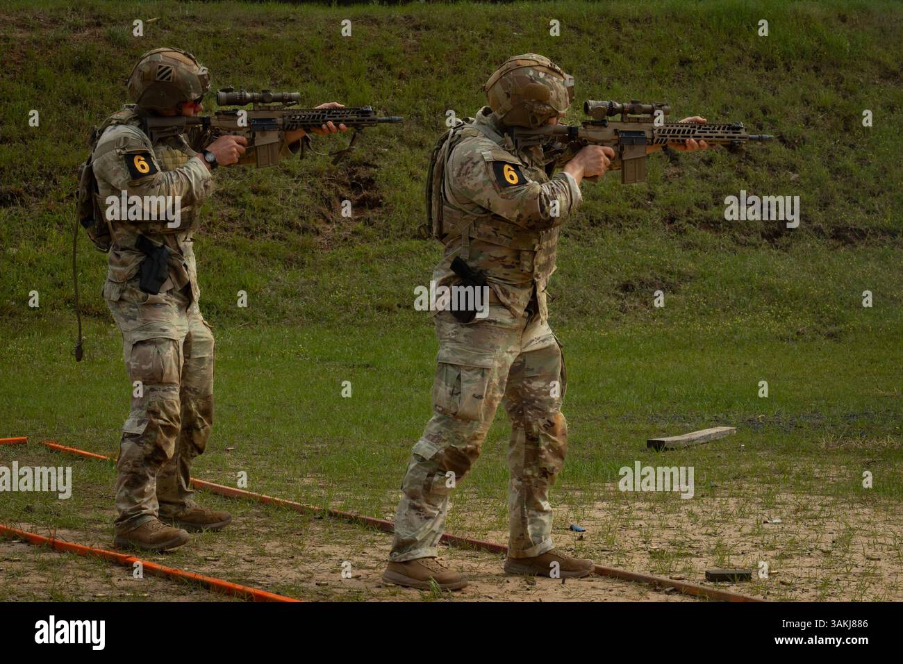 U.S. Army 2nd Lt. Justin Baucom, left, and Staff Sgt. Brent Grafmuller ...