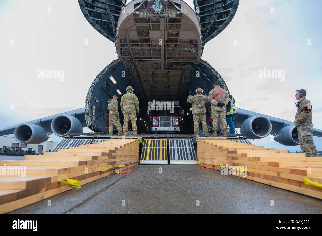 U.S. Air Force Airmen with the 62d Aerial Port Squadron, 446th APS and ...