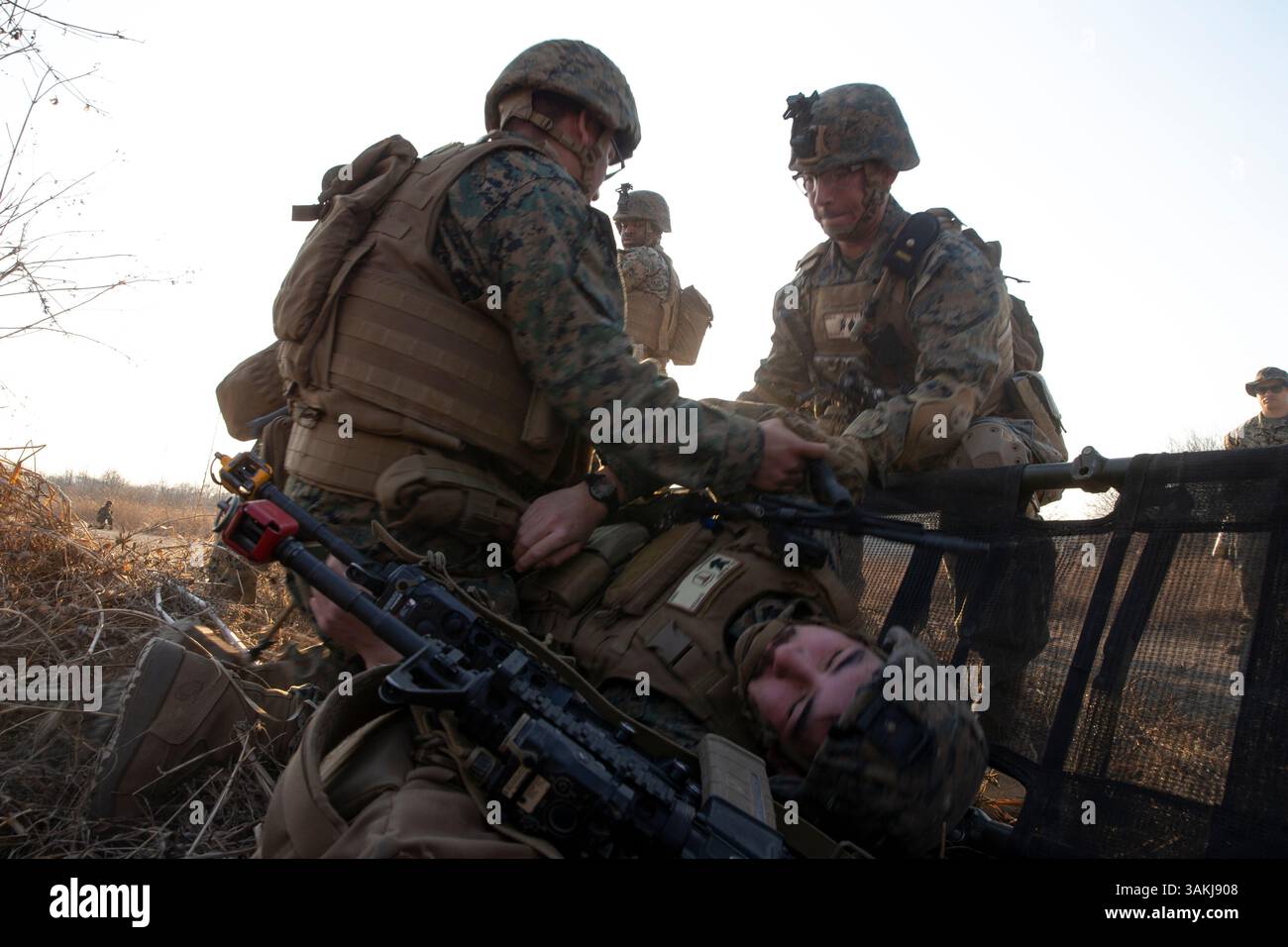 U.S. Marine Corps Sgt. Dylan Brito, right, an administrative specialist ...