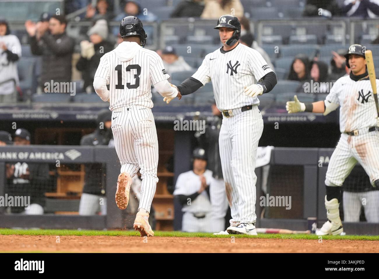 BRONX, NY - APRIL 12: New York Yankees Second Baseman Jazz Chisholm Jr. (13) scores a run along ...