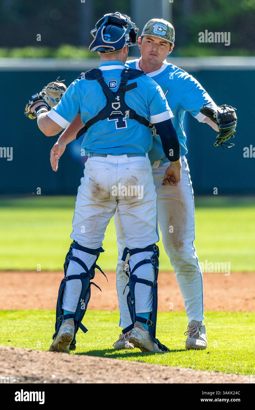 Citadel catcher Garrett Fulmer (4) celebrates with pitcher Anthony ...