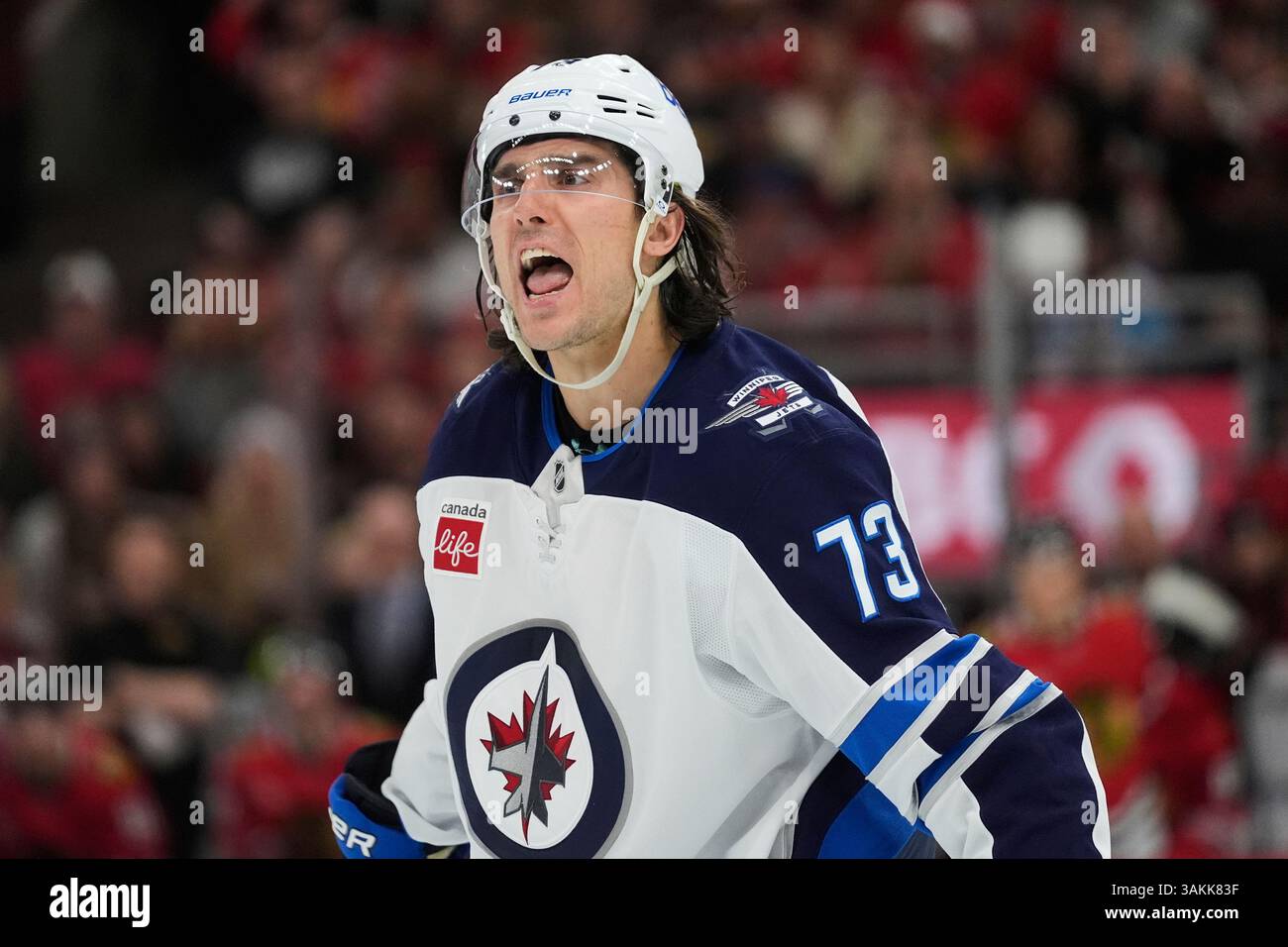 Winnipeg Jets left wing Brandon Tanev argues with an official during ...