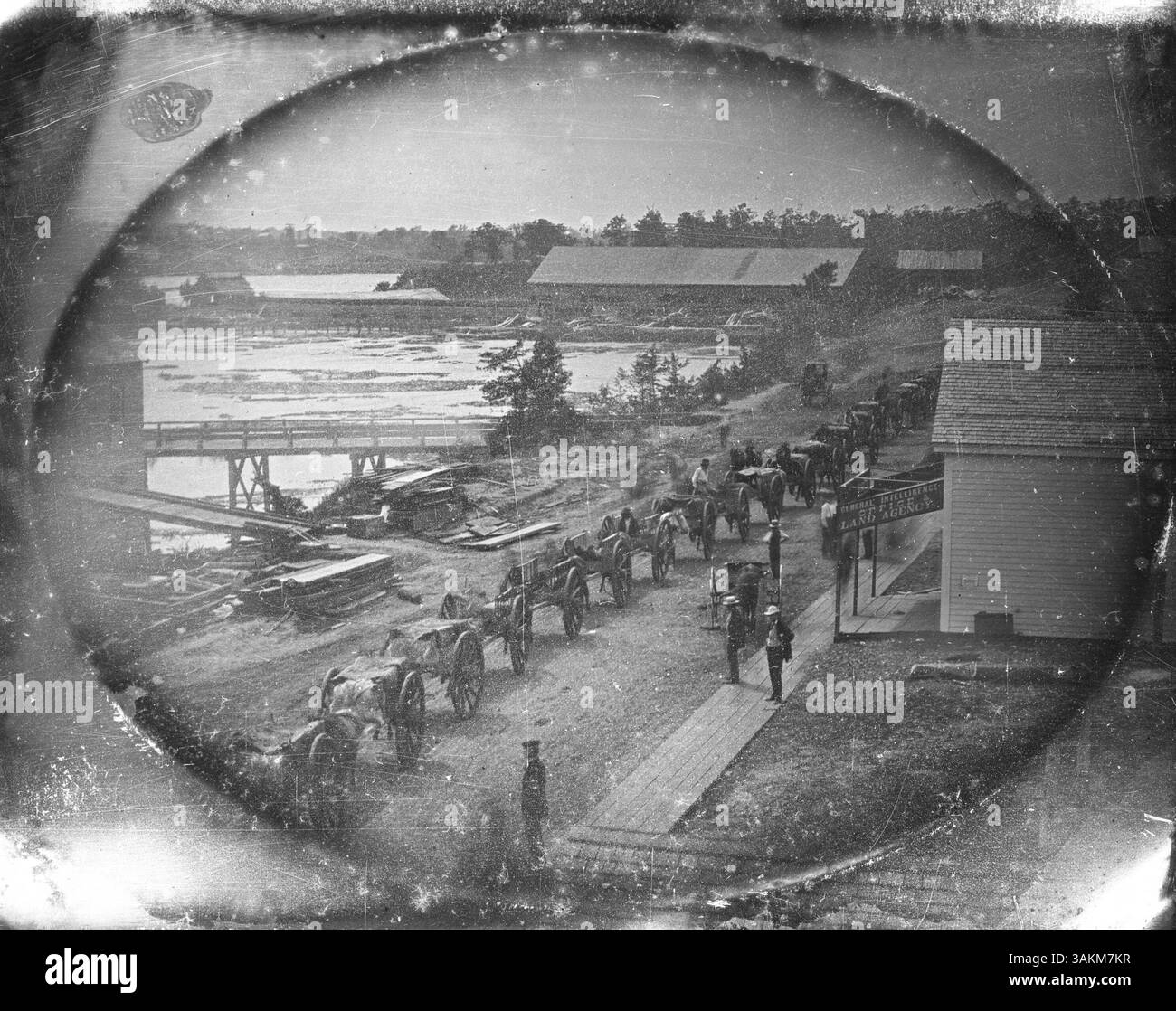 The photograph shows Red River Ox Carts on Main Street in St. Anthony ...
