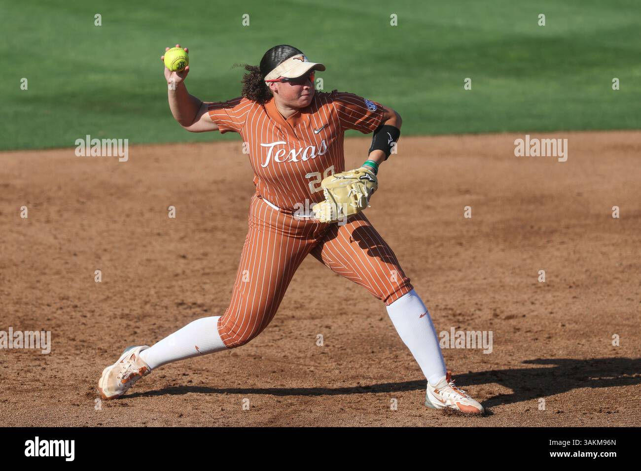 AUSTIN, TX - APRIL 12: Texas utility Katie Stewart (20) throws out a ...