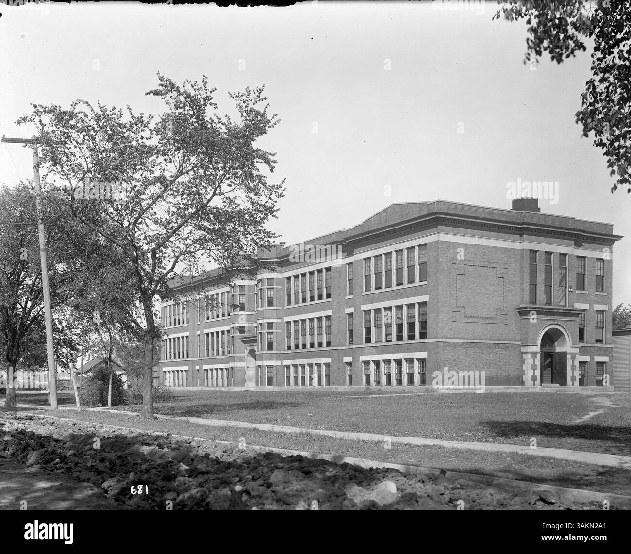 This image captures the exterior of Tuttle School, a historical school ...