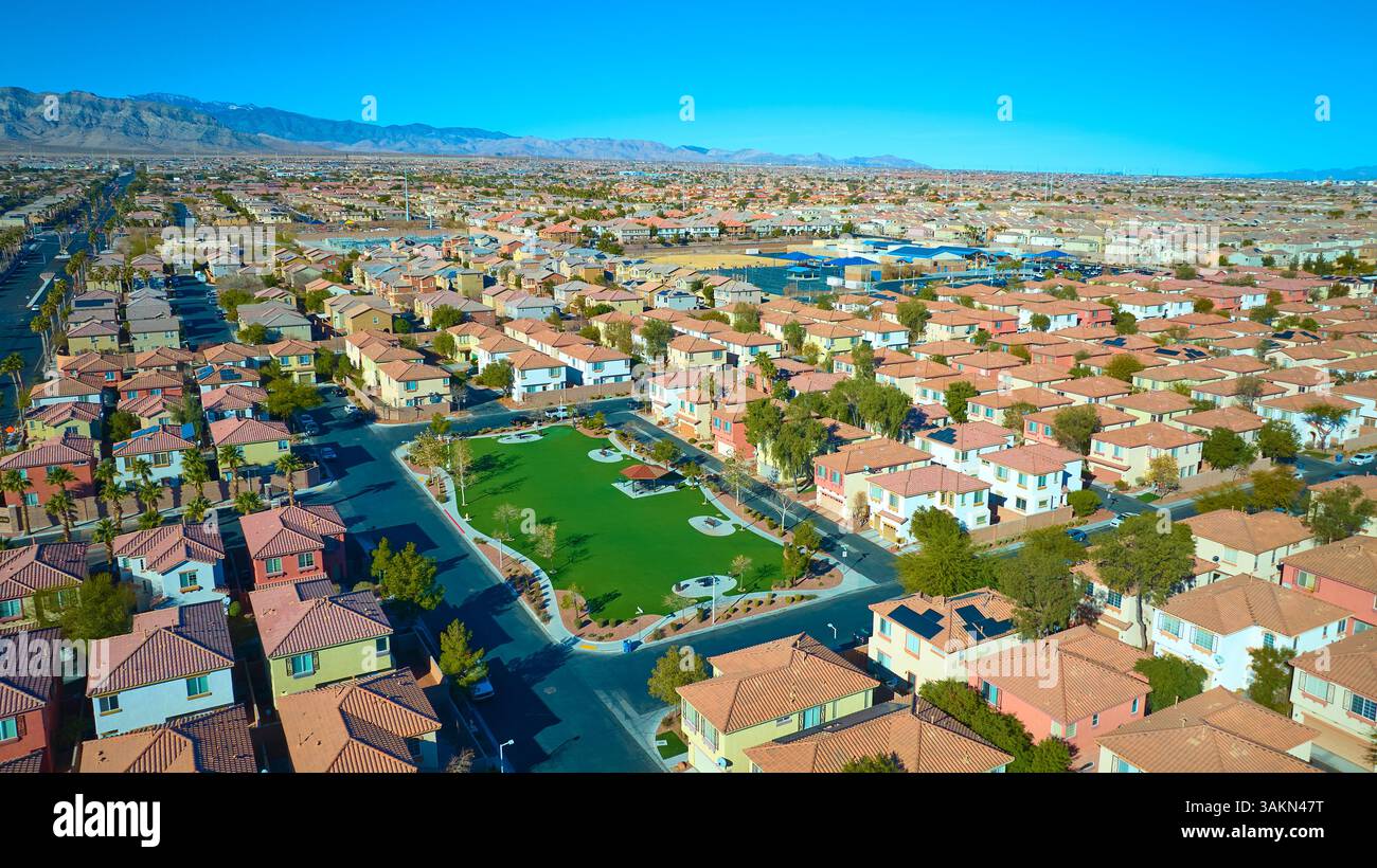 Aerial Suburban Desert Community with Central Park and Mountain Views ...