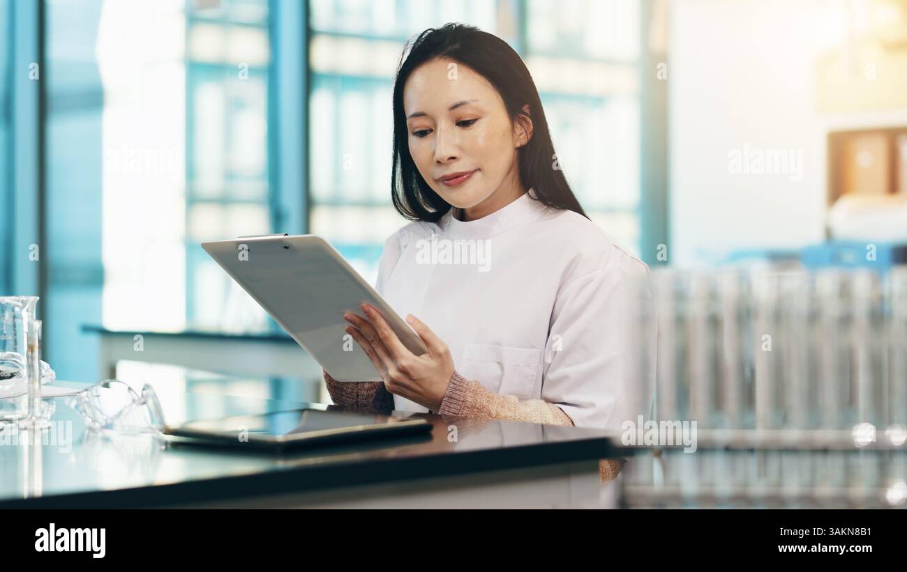 Science, woman and clipboard with reading in laboratory for research ...