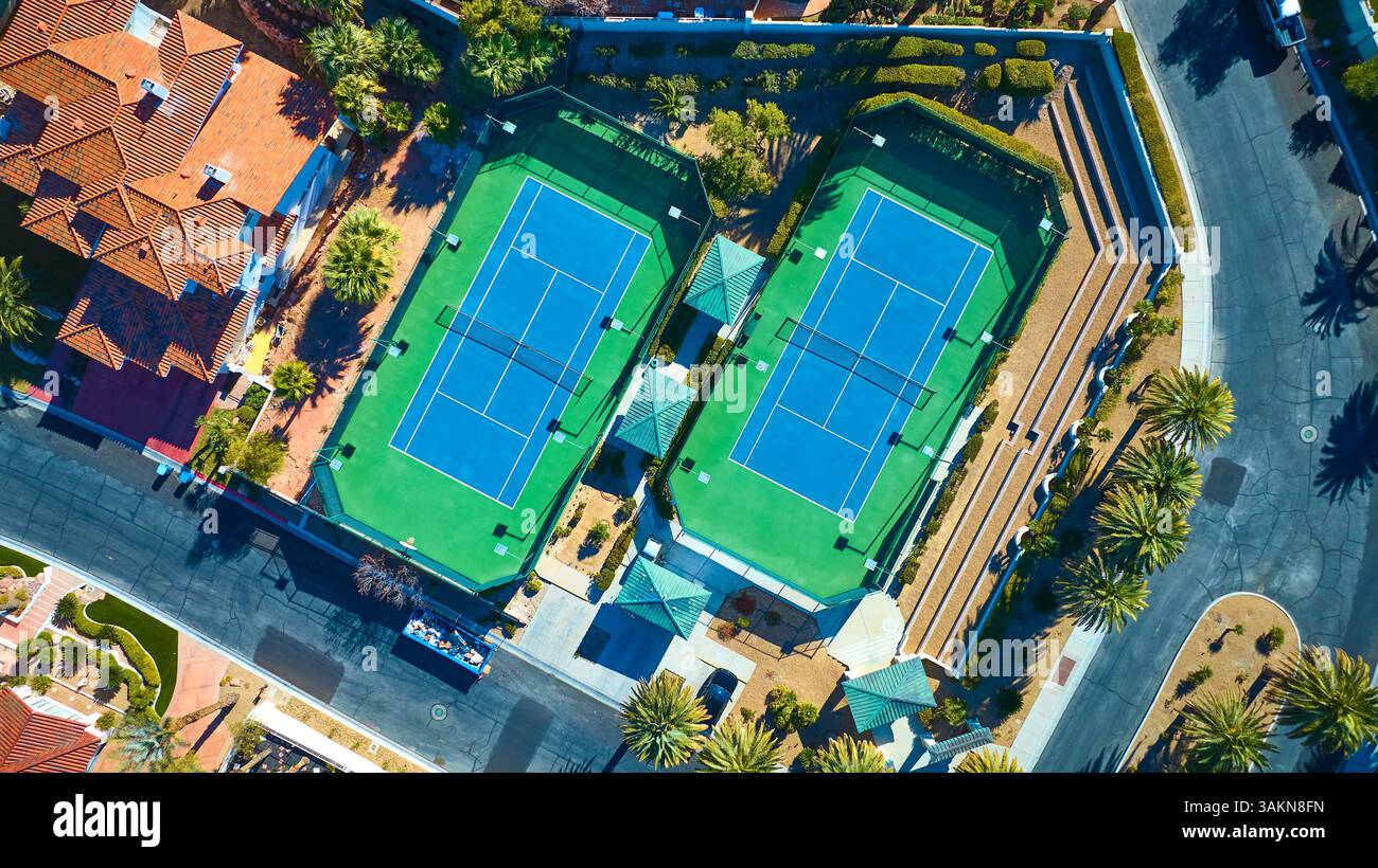 Aerial Top Down of Luxury Tennis Courts in Upscale Suburban ...