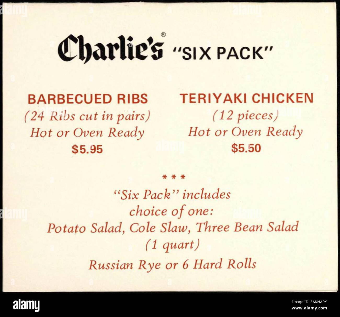 A white tent card printed in red and black, listing ingredients for a ...