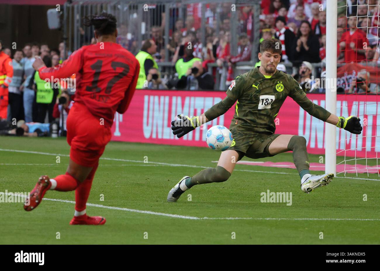 Munich, Germany. 12th Apr, 2025. Borussia Dortmund's goalkeeper Gregor ...
