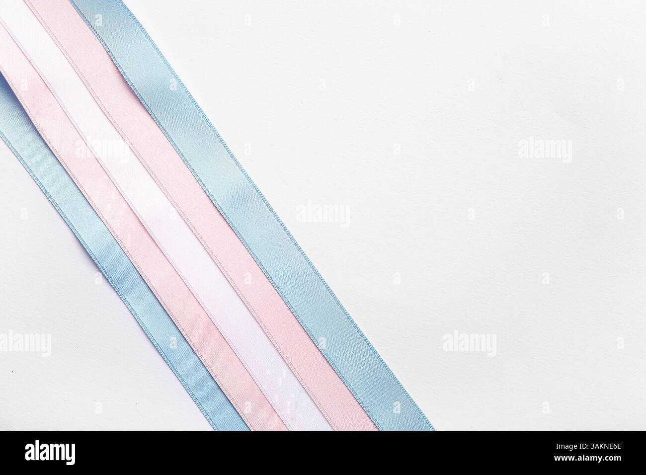 Ribbons in colors of transgender flag on white background Stock Photo ...
