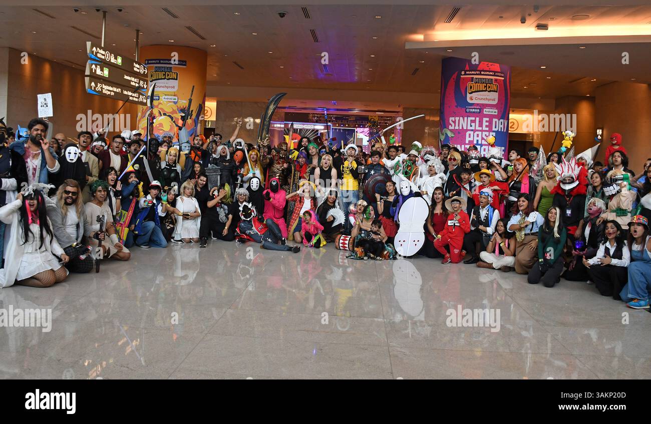 Mumbai, India. 12th Apr, 2025. Cosplayers pose for a photo at Comic Con ...