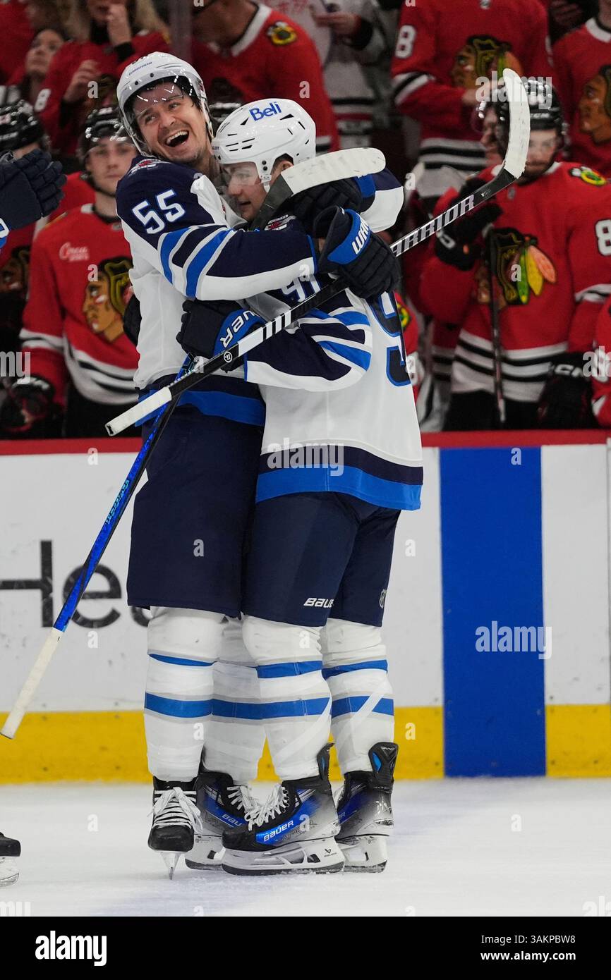 Winnipeg Jets center Mark Scheifele (55) and center Cole Perfetti ...