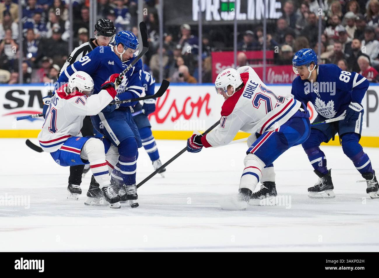 Toronto Maple Leafs' John Tavares (91) and Montreal Canadiens' Jake ...