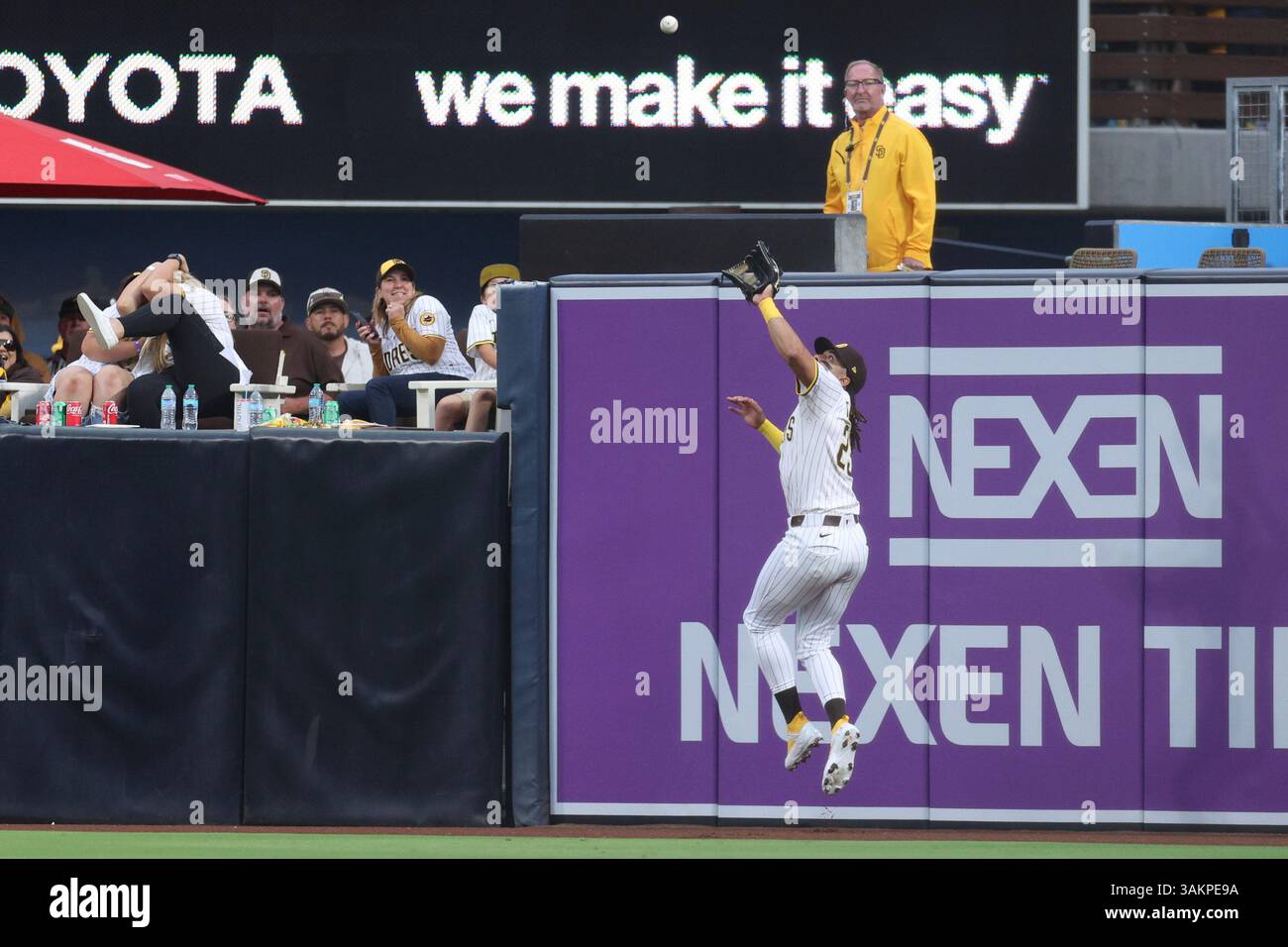 San Diego Padres right fielder Fernando Tatis Jr. catches a fly ball at the wall hit by Colorado ...