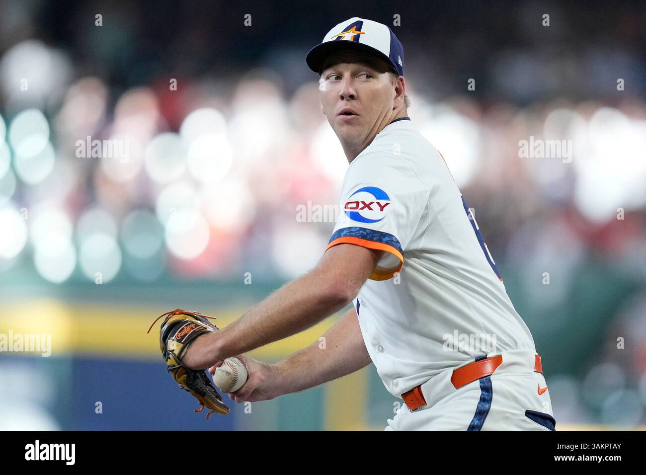 Houston Astros starting pitcher Ryan Gusto (67) delivers during the ...
