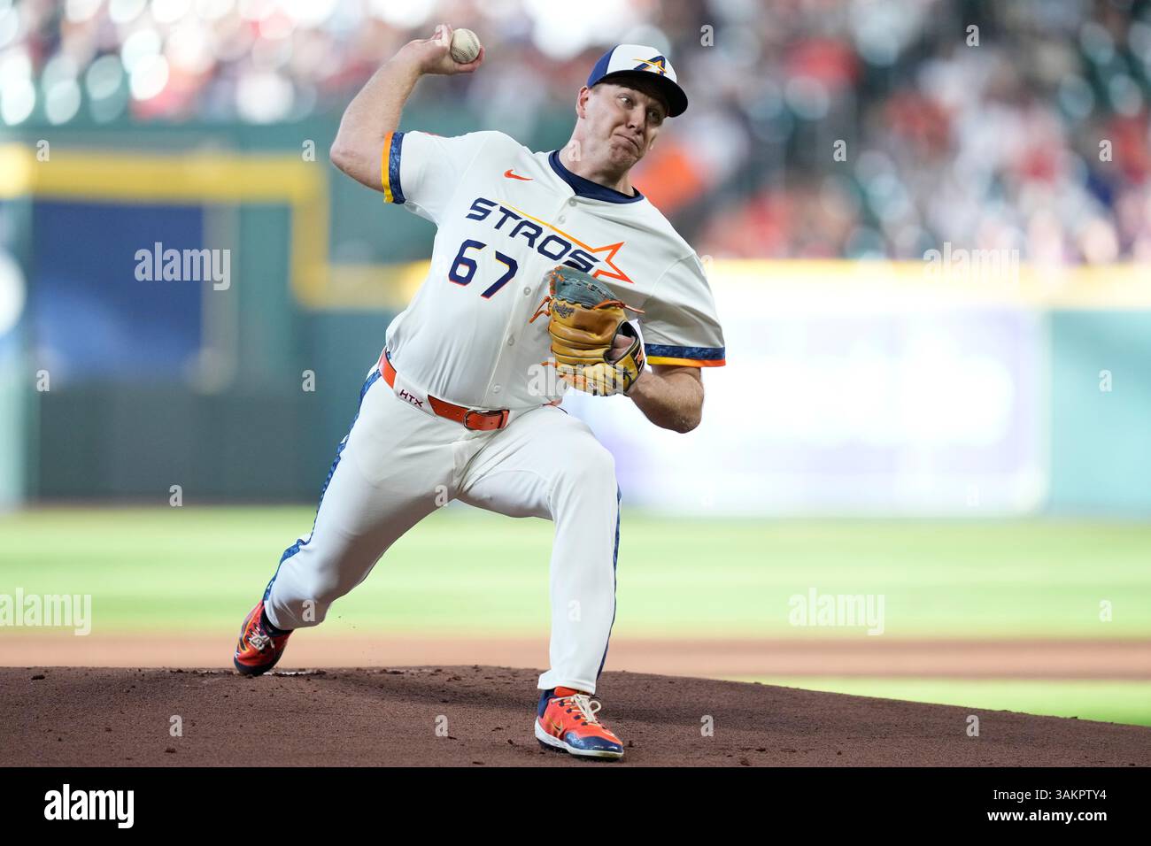 Houston Astros starting pitcher Ryan Gusto (67) delivers during the ...