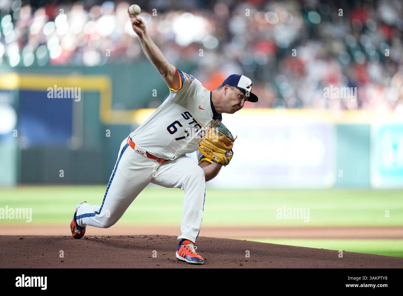 Houston Astros starting pitcher Ryan Gusto (67) delivers during the ...