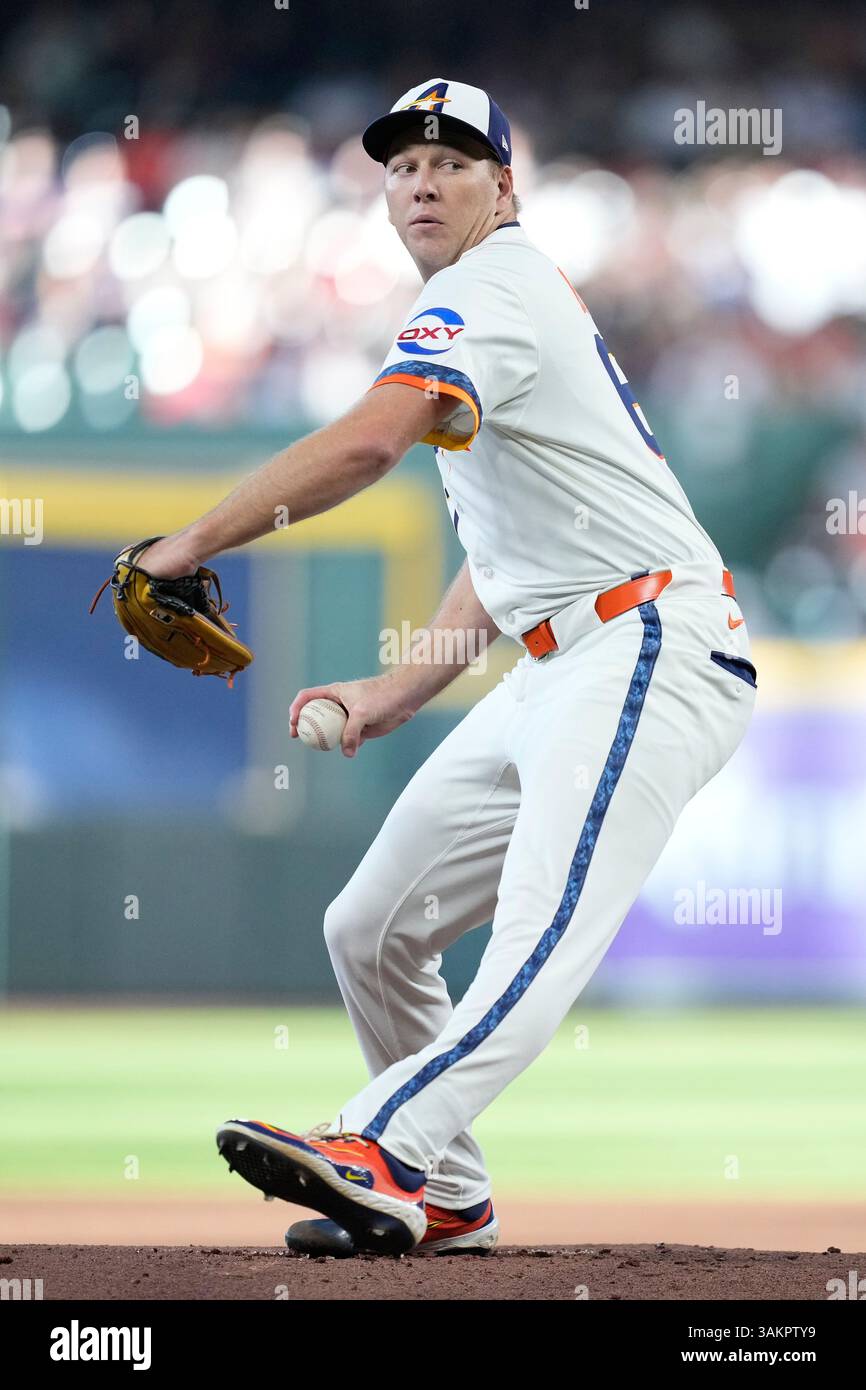 Houston Astros starting pitcher Ryan Gusto (67) delivers during the ...