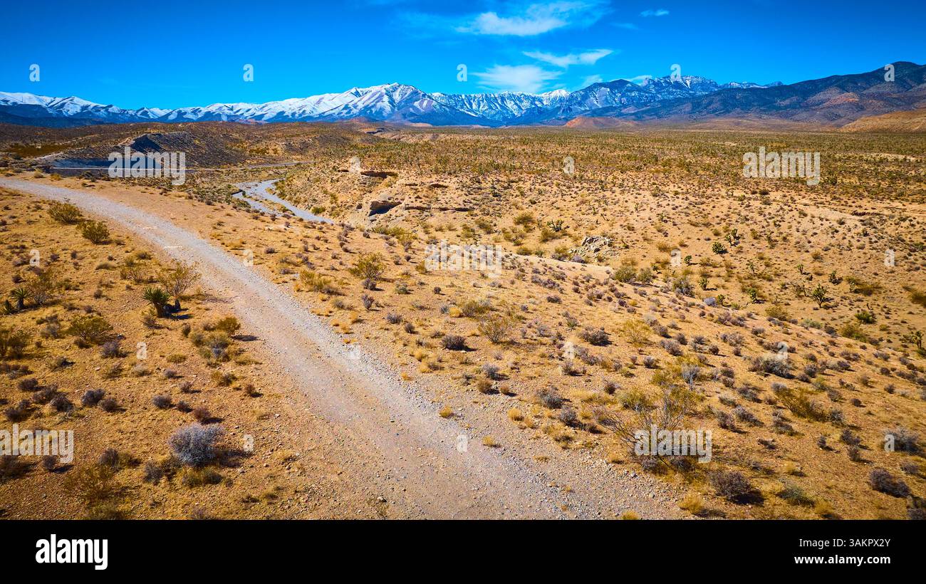 Aerial Desert Road and Snow-Capped Mountains Nevada Stock Photo - Alamy