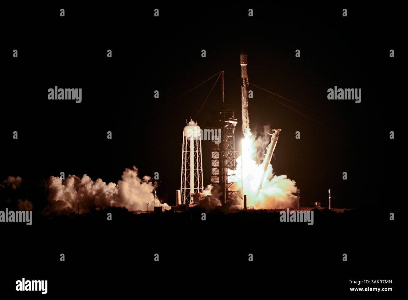 A SpaceX Falcon 9 rocket launches its Starlink Satellites into orbit ...