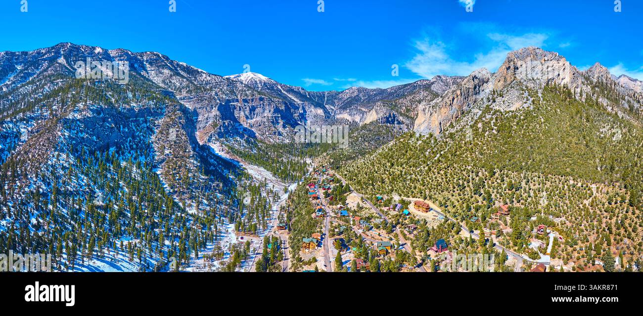 Aerial of Snow-Capped Mt Charleston and Remote Nevada Community Stock ...