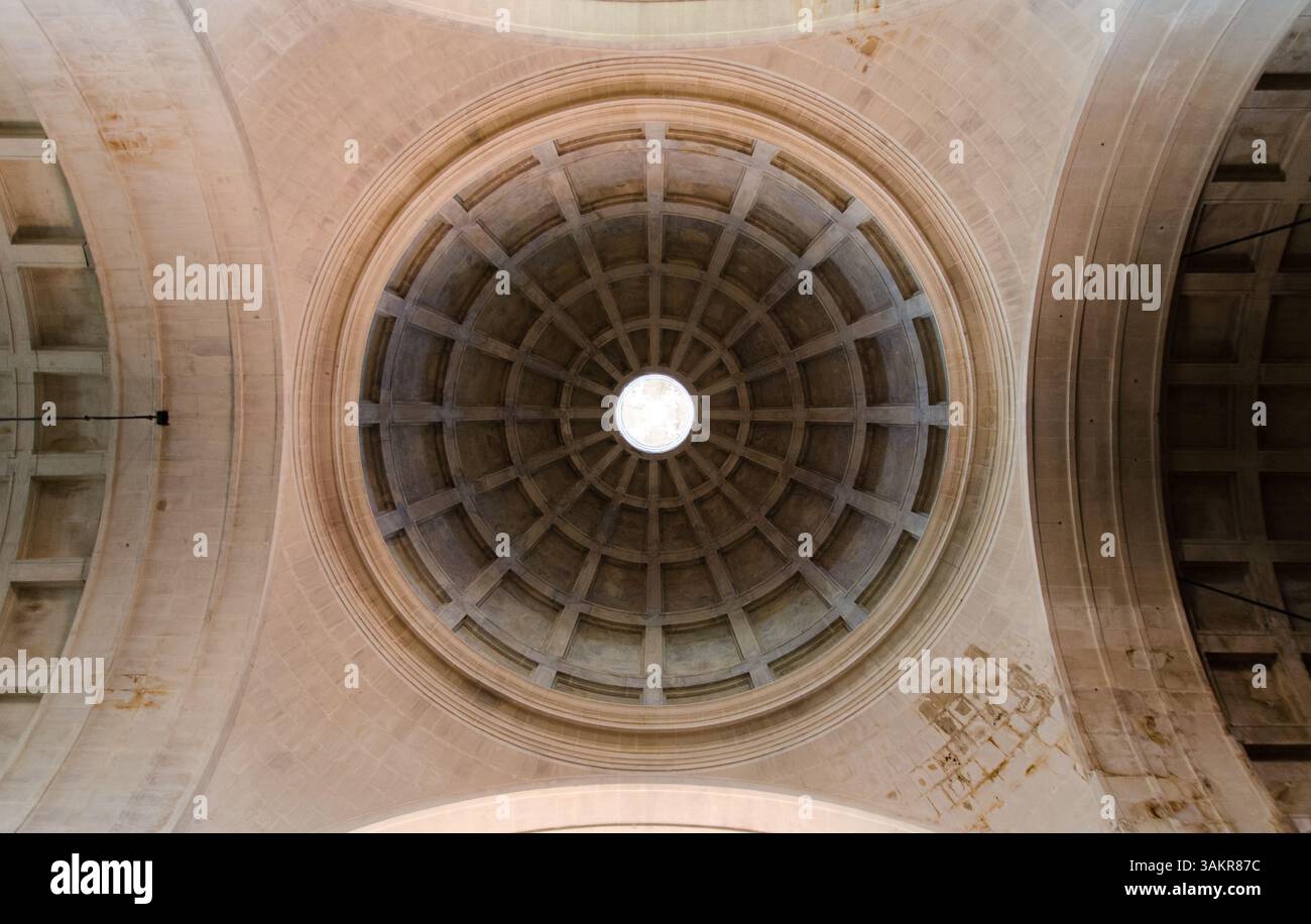 The cupola of a stone medieval church seen symmetrically, directly from ...