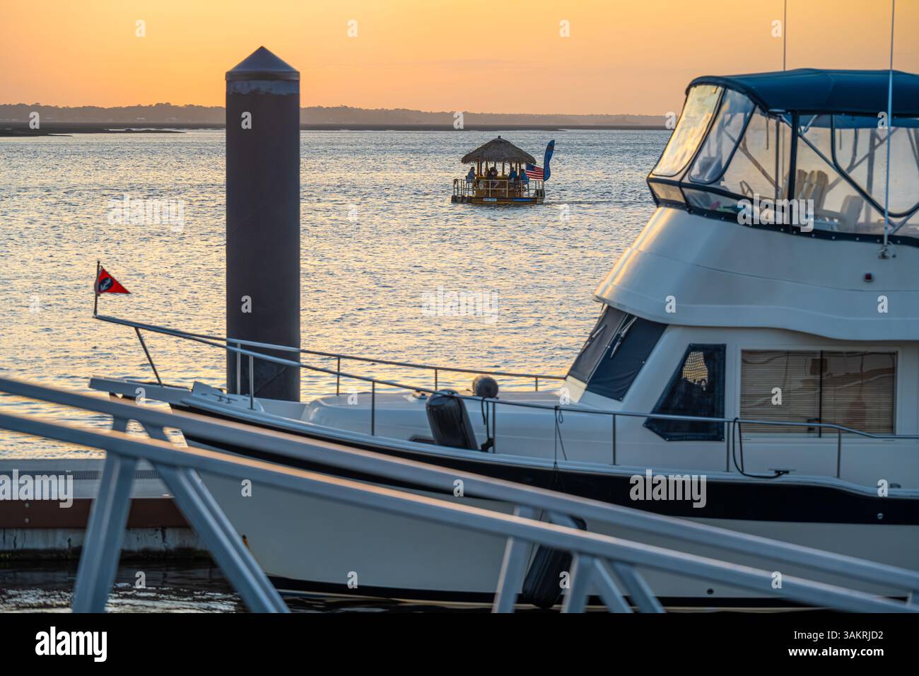 Yacht and tiki bar raft at sunset on the Amelia River (Intracoastal ...