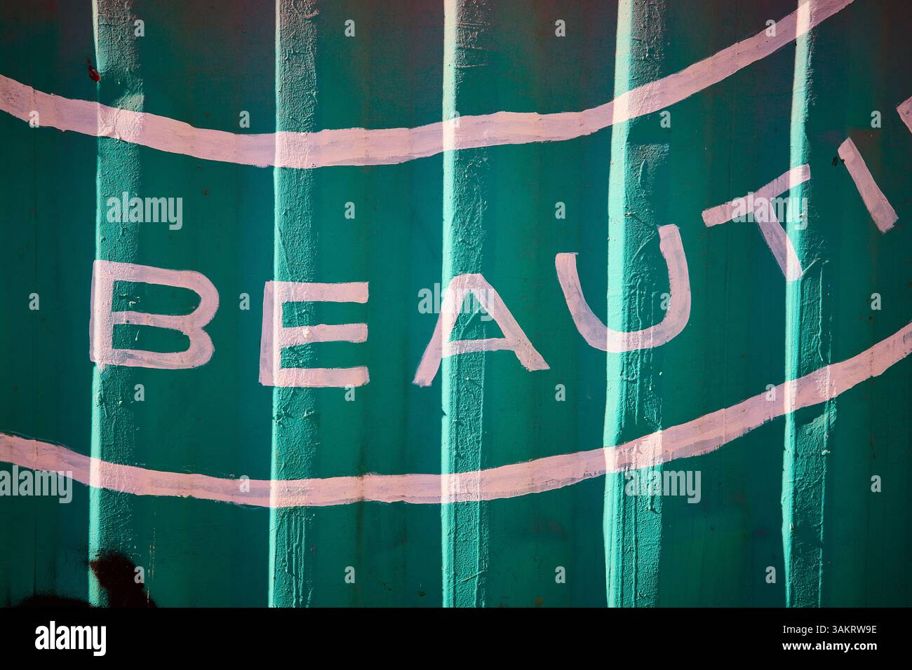 Urban Art Teal Wall with BEAUTI Text Eye-Level Perspective Stock Photo ...