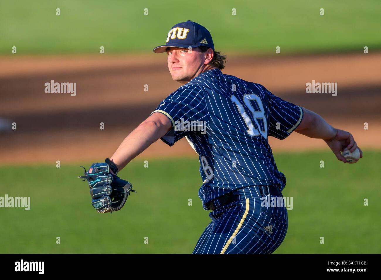 FIU pitcher Logan Runde (18) throws the ball from the mound during an ...