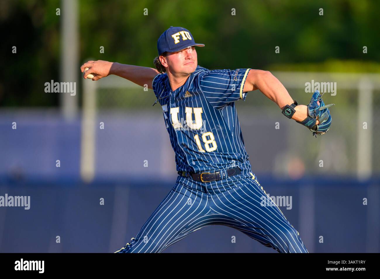 FIU pitcher Logan Runde (18) throws the ball from the mound during an ...