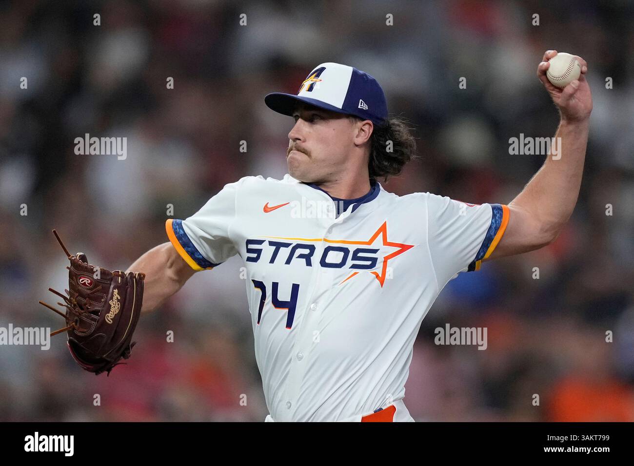 Houston Astros pitcher Bryan King (74) delivers during the eighth ...