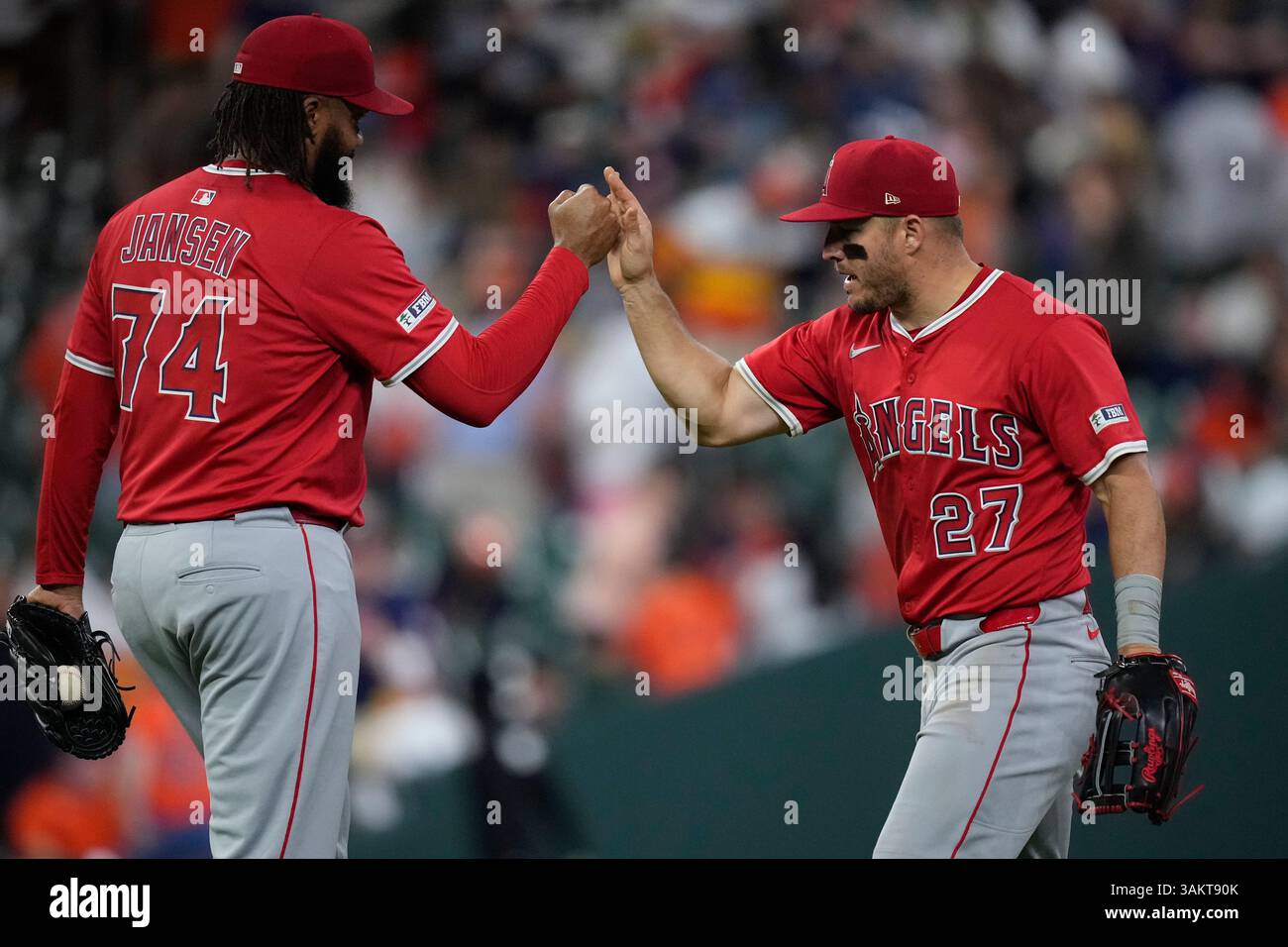 Los Angeles Angels pitcher Kenley Jansen (74) and right fielder Mike ...