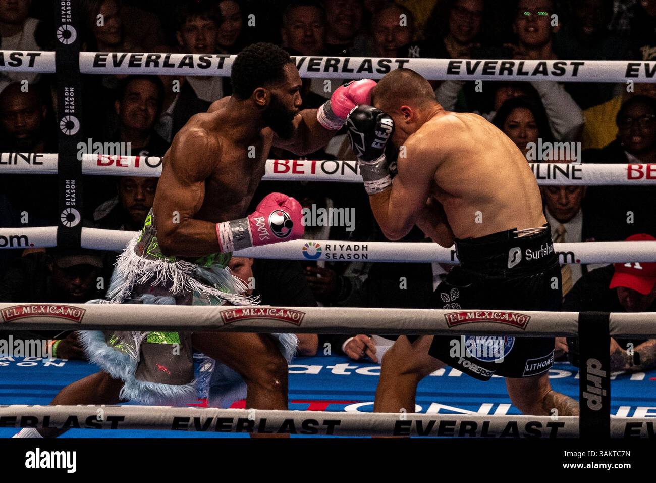 April 12, 2025, Atlantic City, New Jersey, USA: Action between IBF welterweight champion Jaron â ...