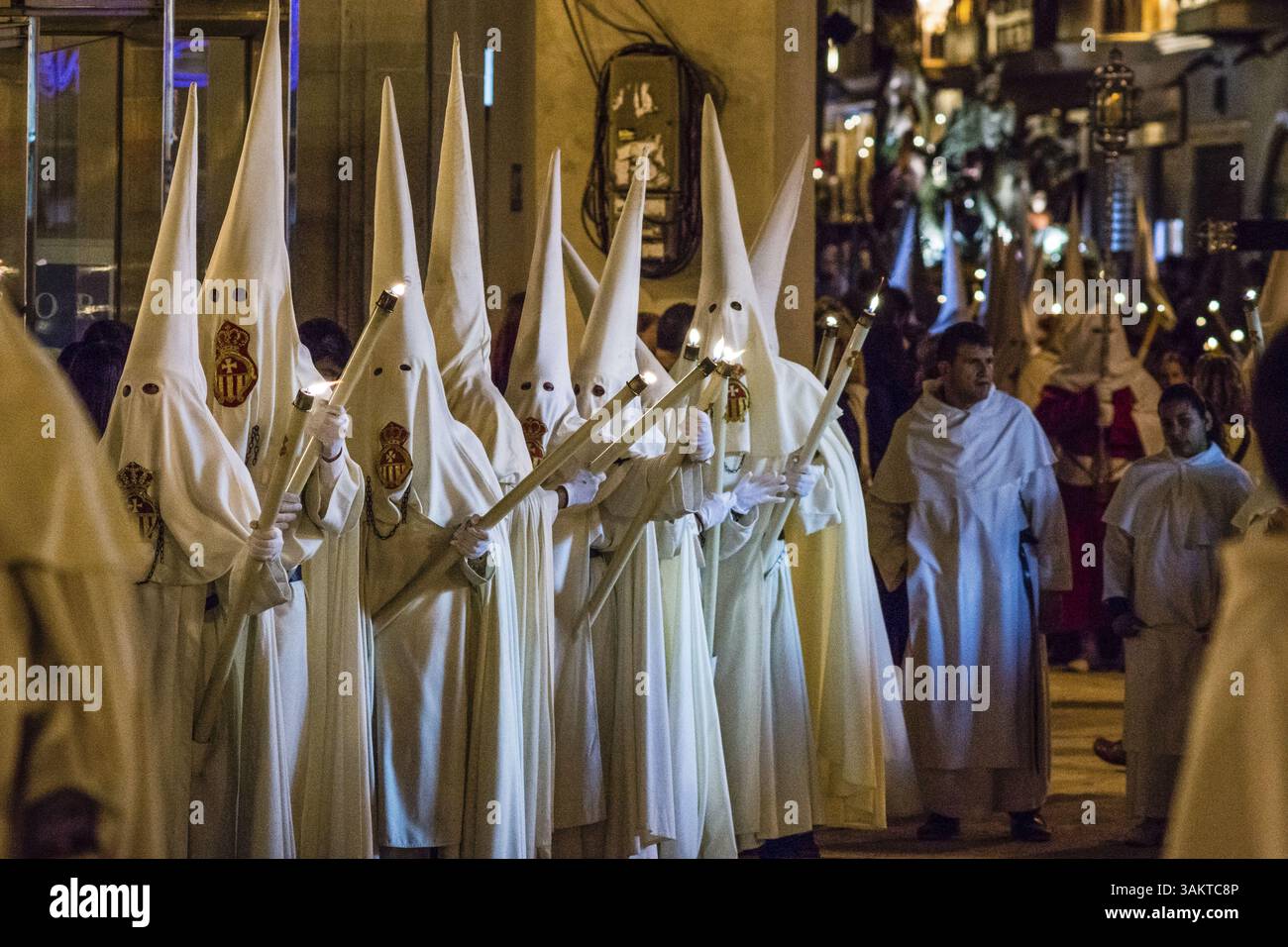 Hooded brothers, Holy Week in the Plaza Major, Holy Thursday procession ...